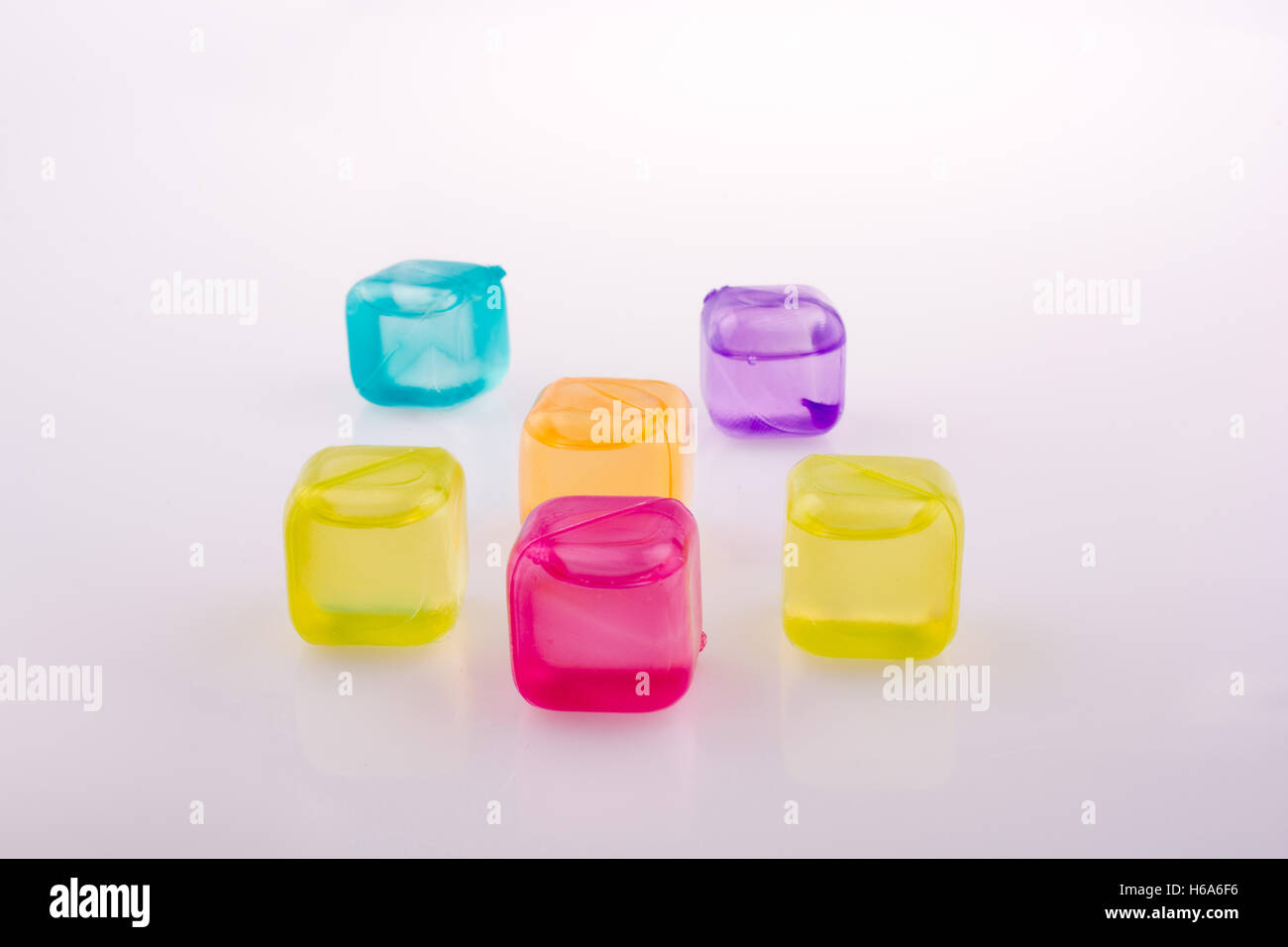 Fake colorful ice cubes on a white background Stock Photo - Alamy