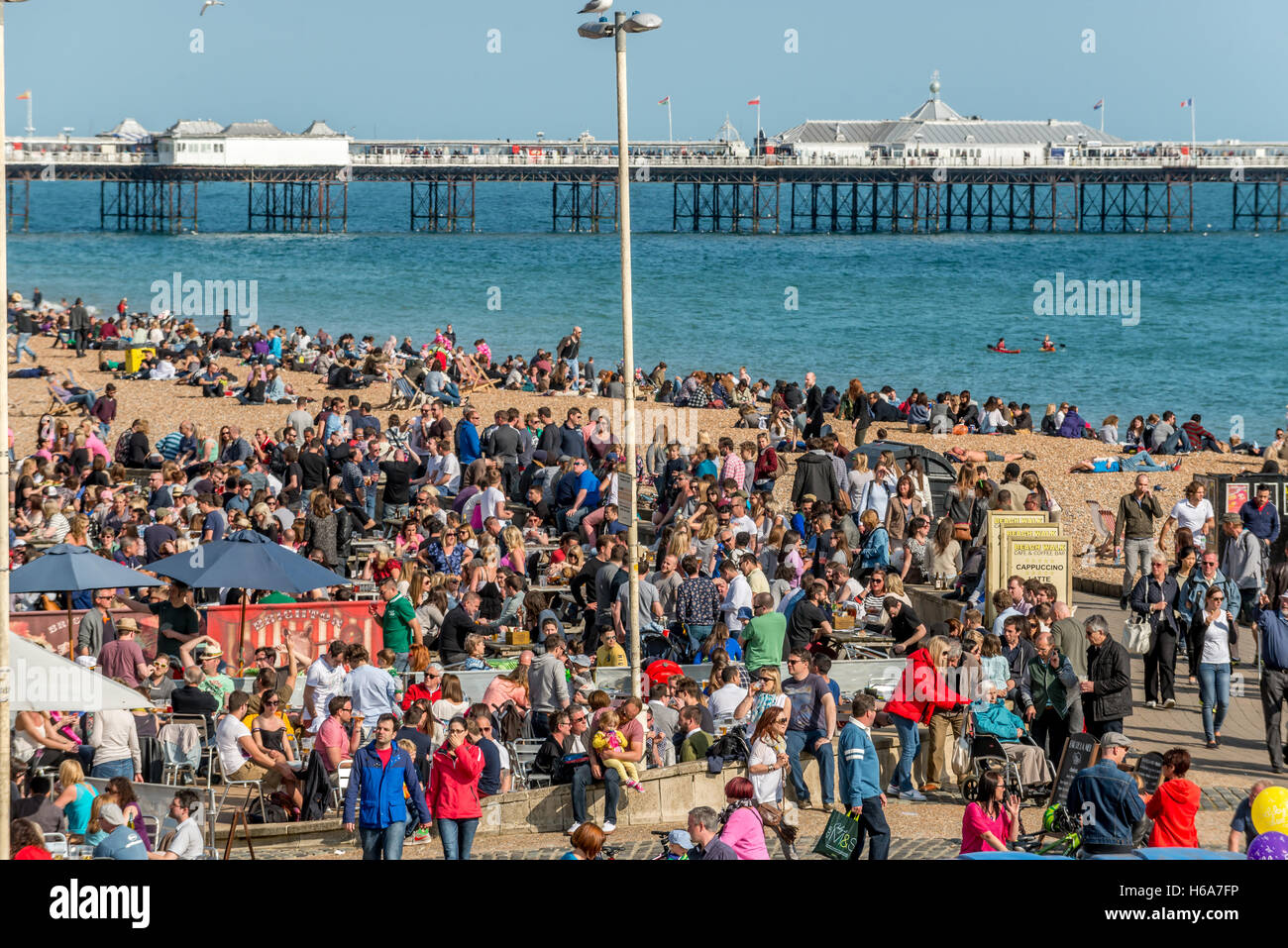 A bright, busy May morning on Brighton seafront Stock Photo - Alamy