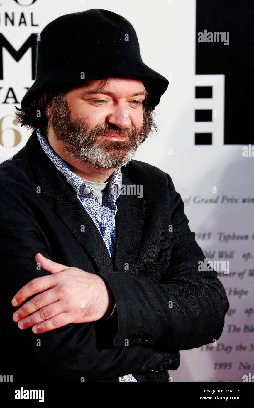 Tokyo, Japan. 25th Oct, 2016. Artist Jim O'Rourke poses for the cameras ...