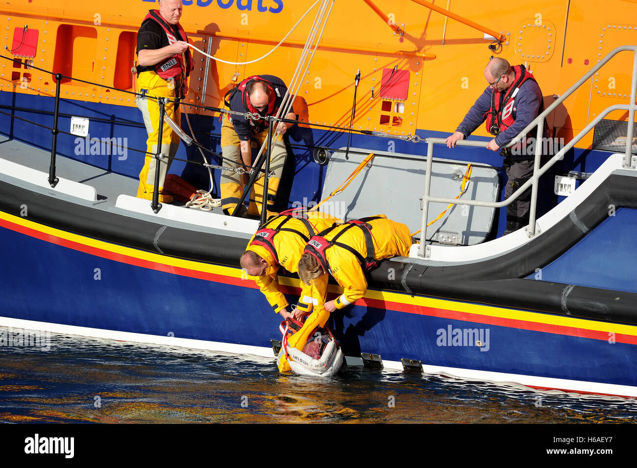 RNLI Lifeboat practice a man overboard rescue exercise, Weymouth ...