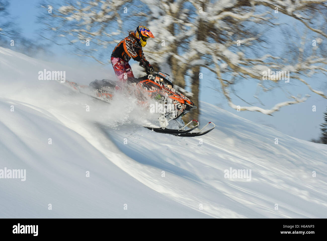 Snowmobile jumping extreme snowmobiling hi-res stock photography and ...