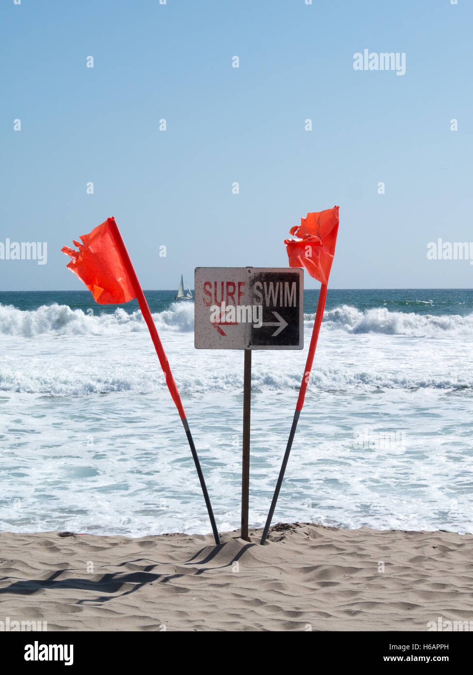 Surf and swim areas separation sign by the sea Stock Photo - Alamy