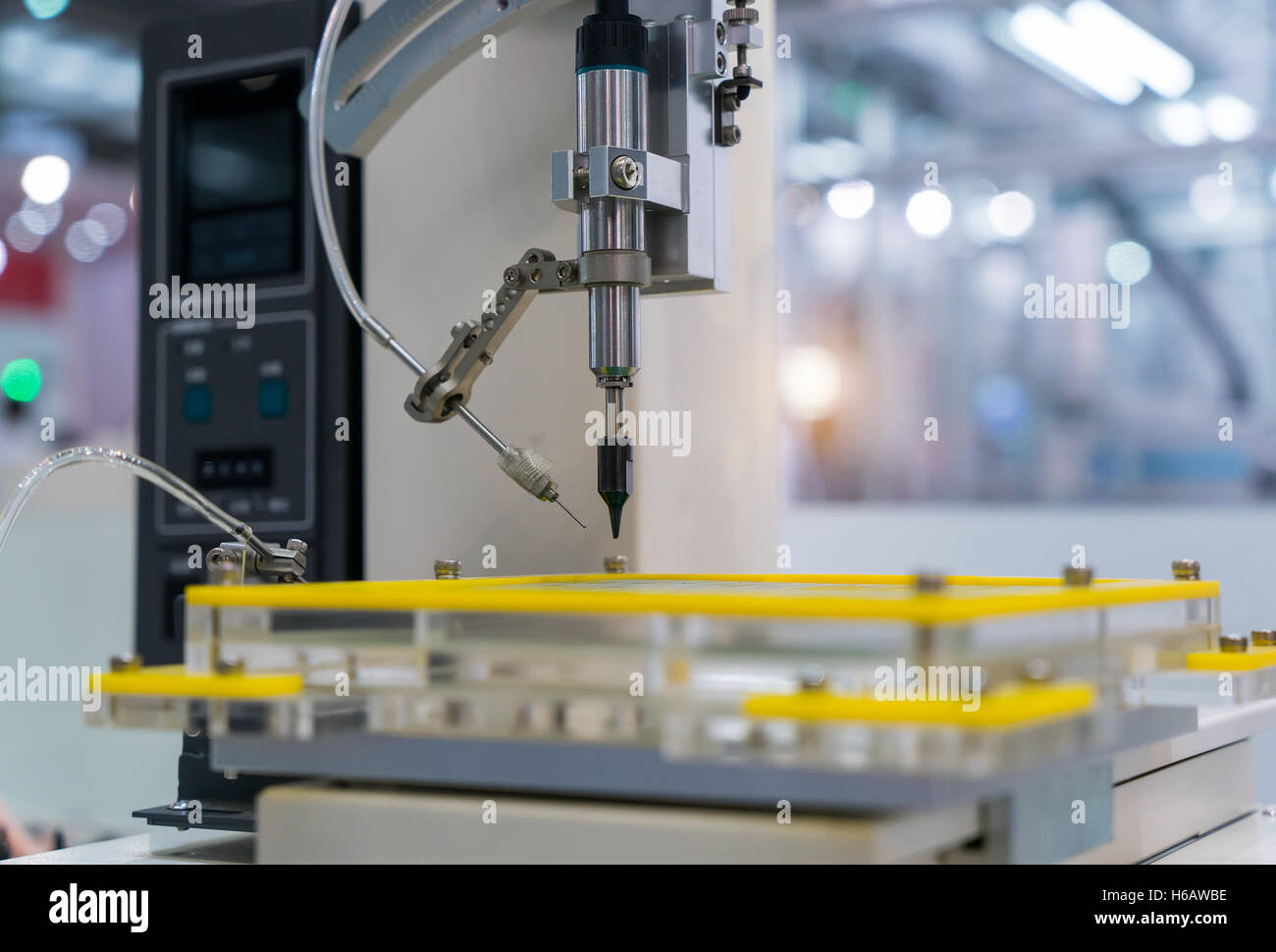 Robotic arm at production line in factory Stock Photo - Alamy