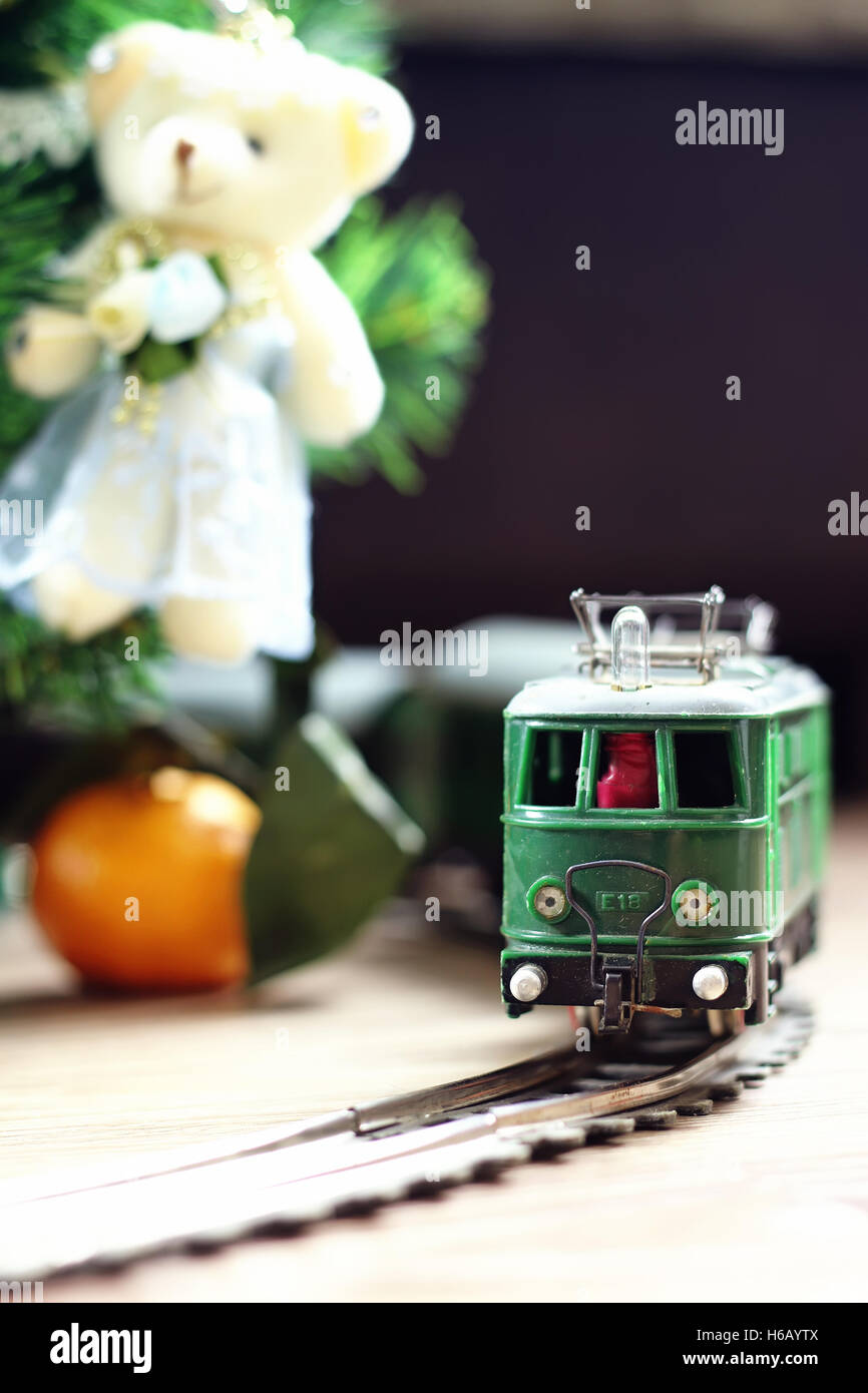 train under tree gift Stock Photo - Alamy