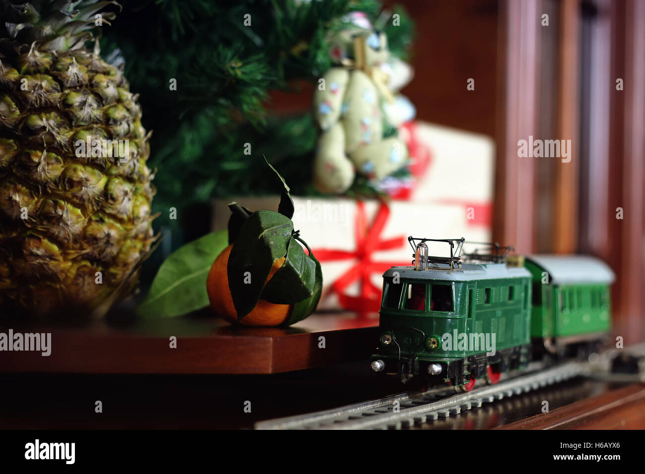 train under tree gift Stock Photo - Alamy