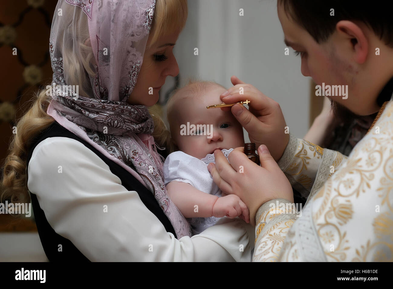 VOLOGDA, RUSSIA - DECEMBER 25, 2015: A ceremony of epiphany baby Stock ...