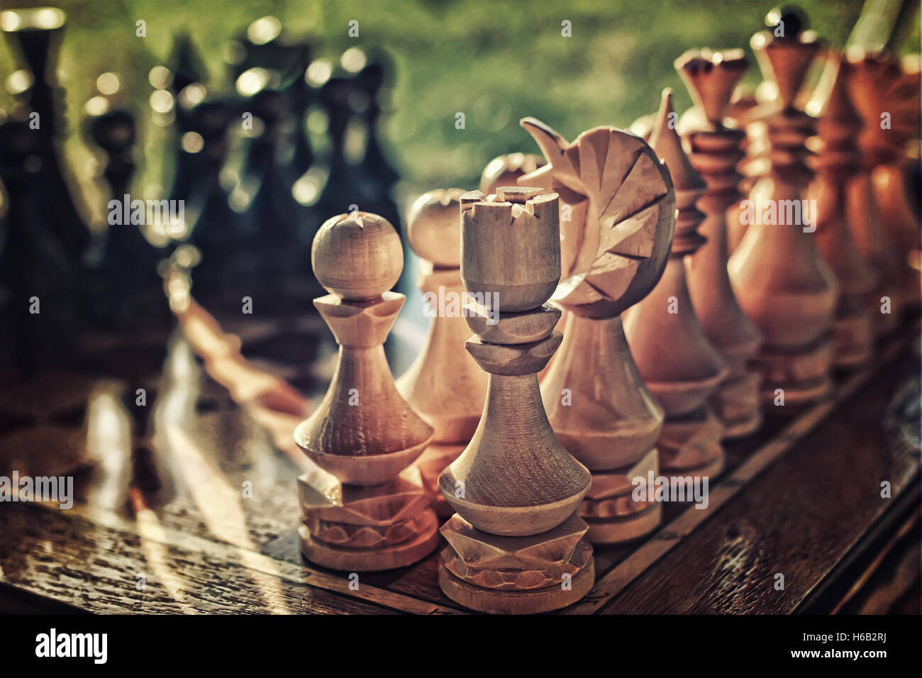 textured retro effect photo of chess on board concept Stock Photo - Alamy