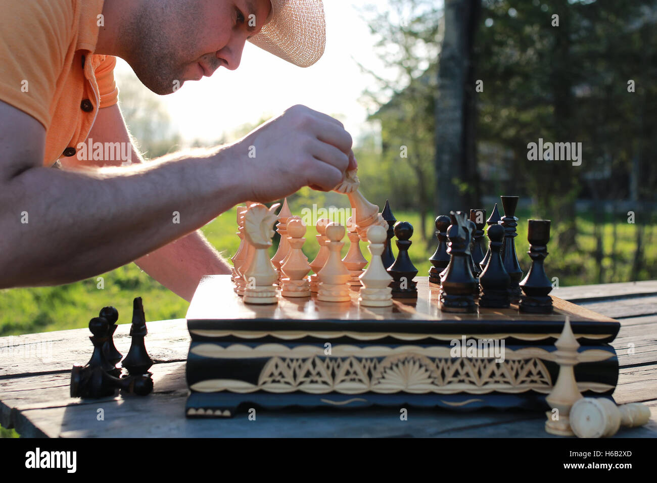 chess man hand outdoor Stock Photo - Alamy