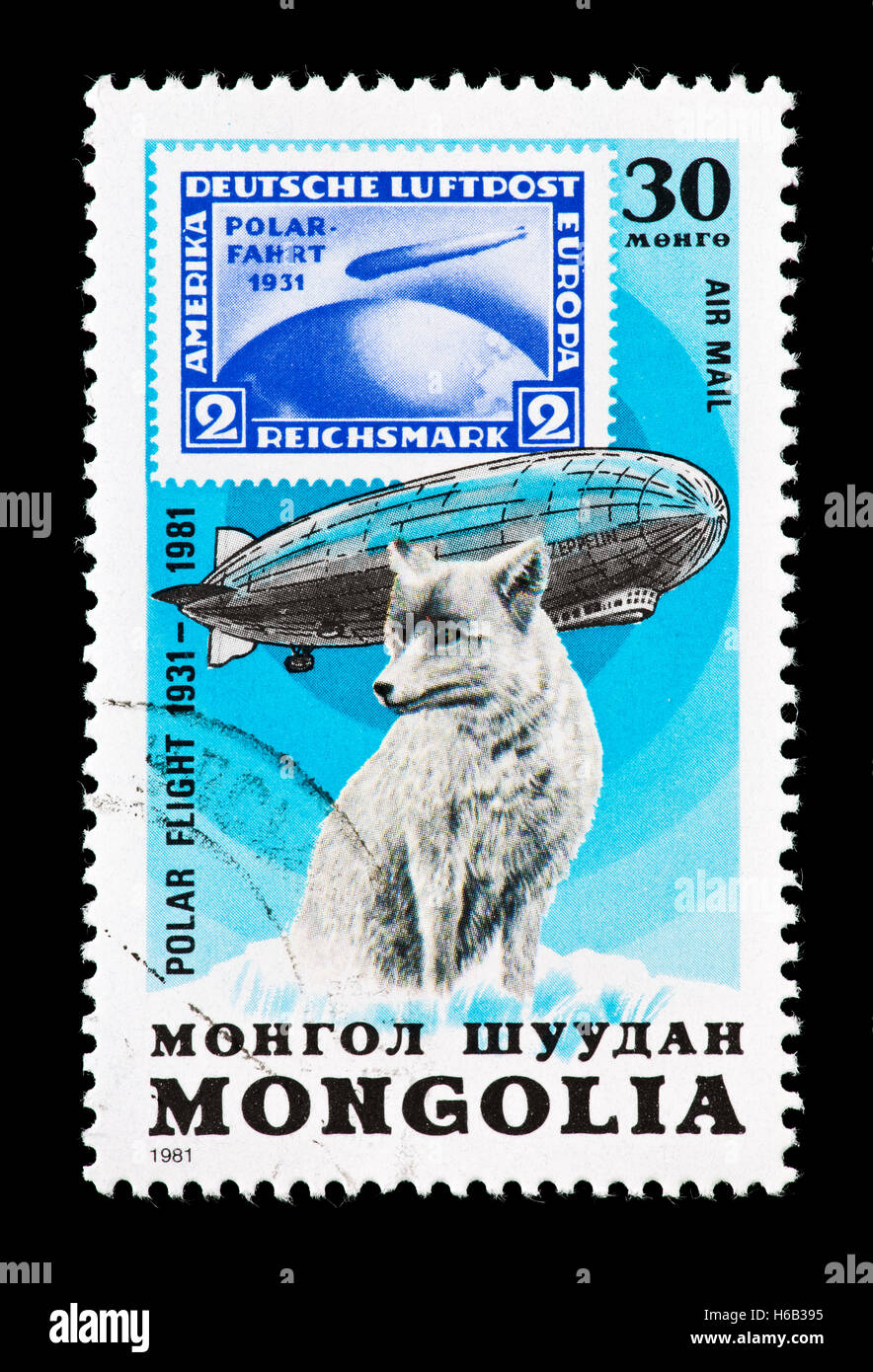 Postage stamp from Mongolia depicting the Graf Zeppelin and polar fox ...