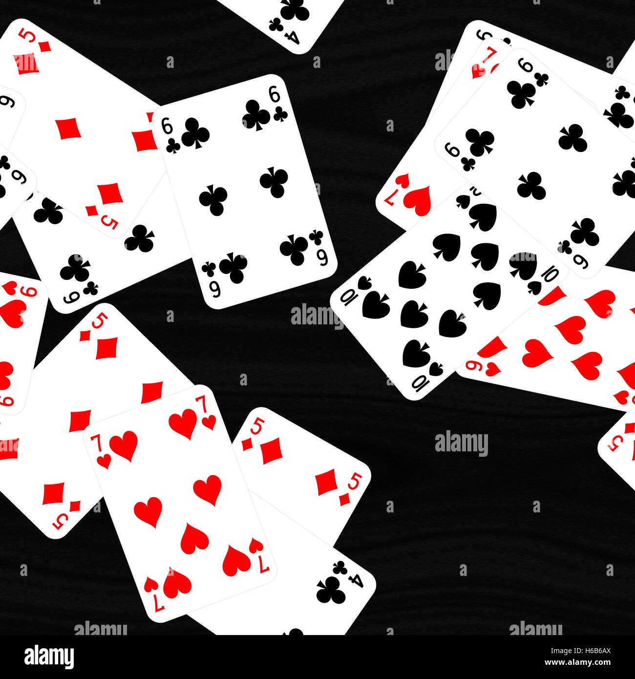 Pile of playing cards on black table Stock Photo - Alamy