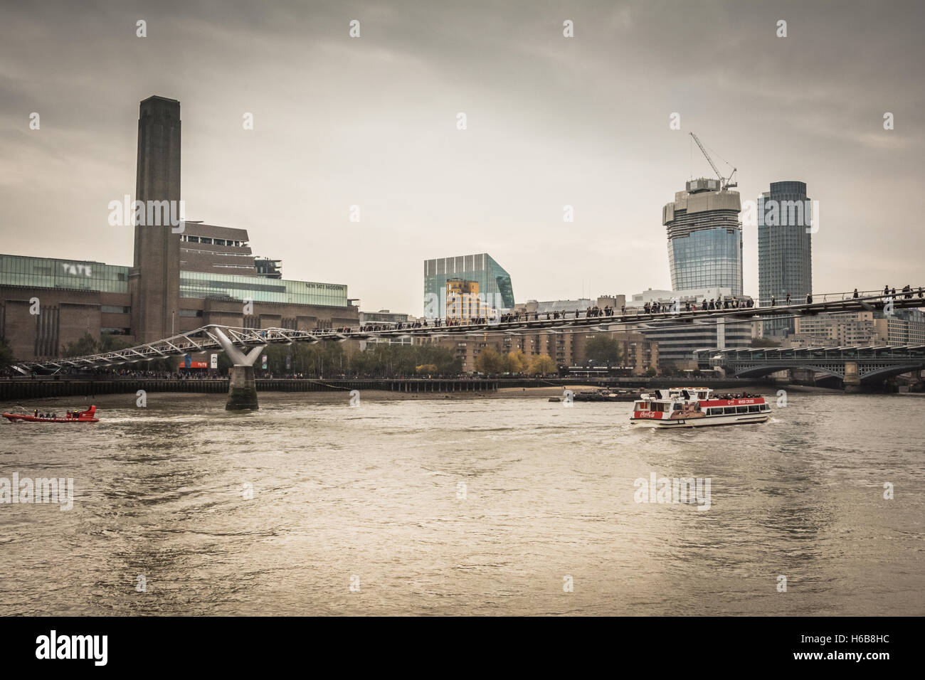 The Tate Modern and Millennium Bridge on the River Thames, Bankside ...