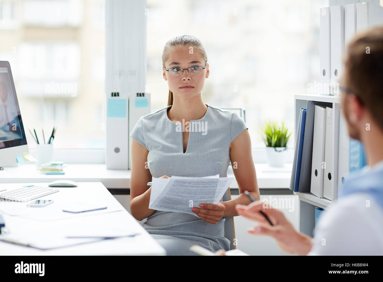 Talk with boss Stock Photo - Alamy