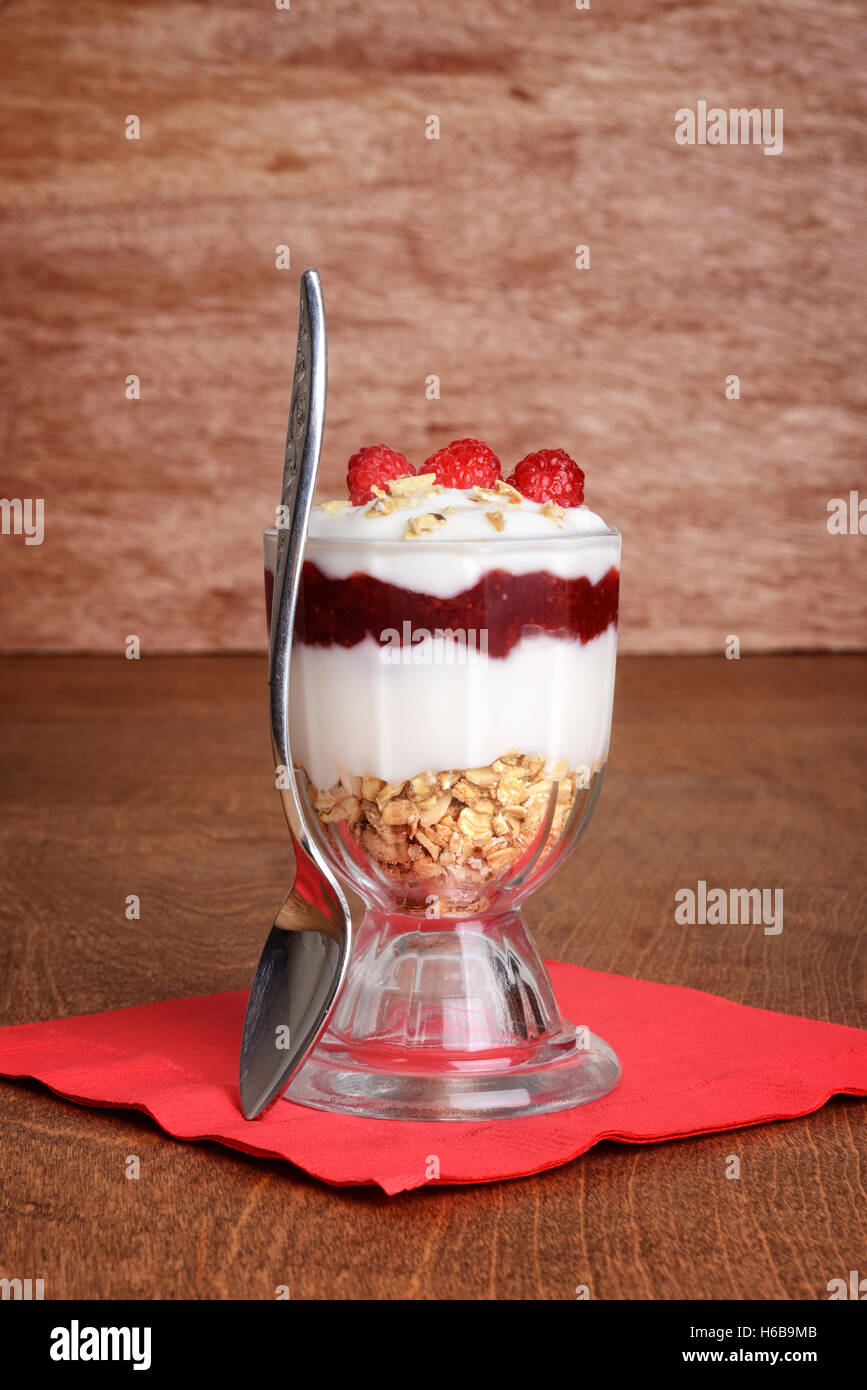 raspberry vanilla parfait with spoon Stock Photo - Alamy