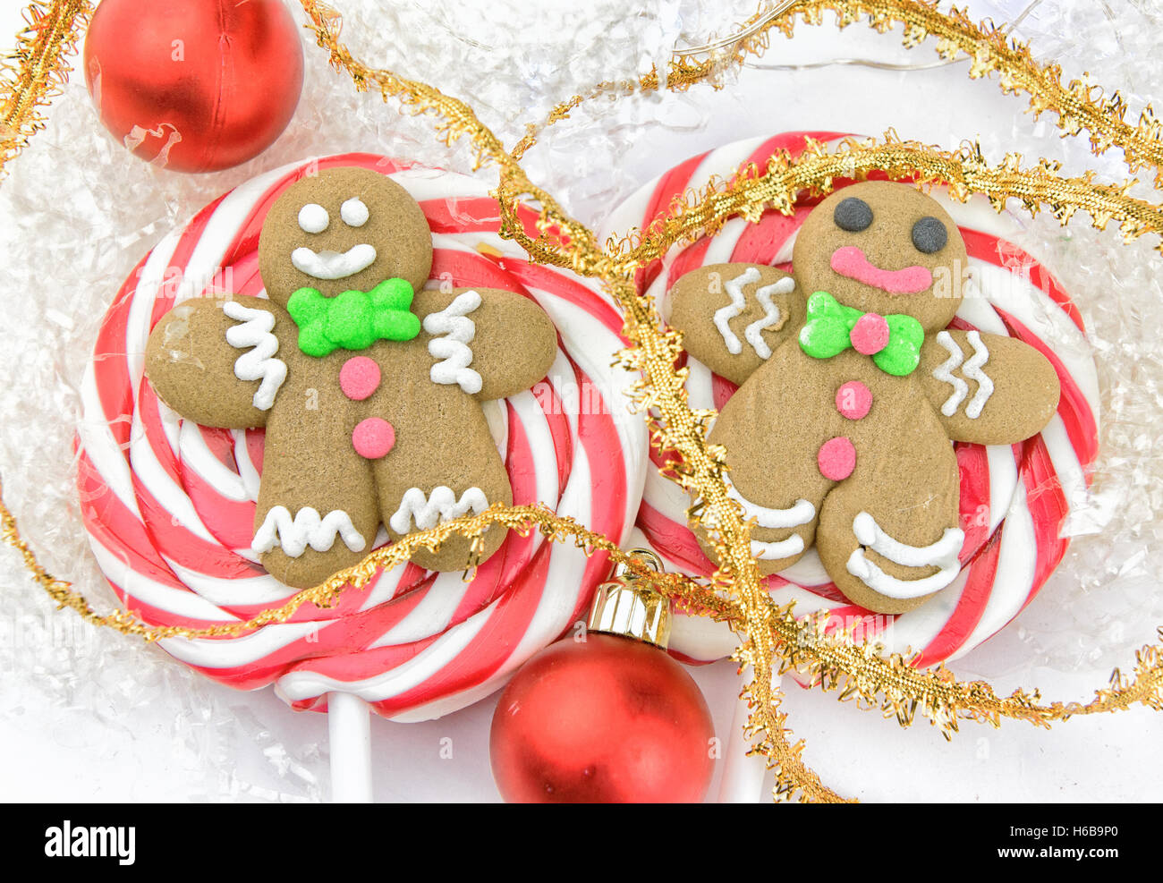 Gingerbread man Christmas lollipops with decorations Stock Photo - Alamy