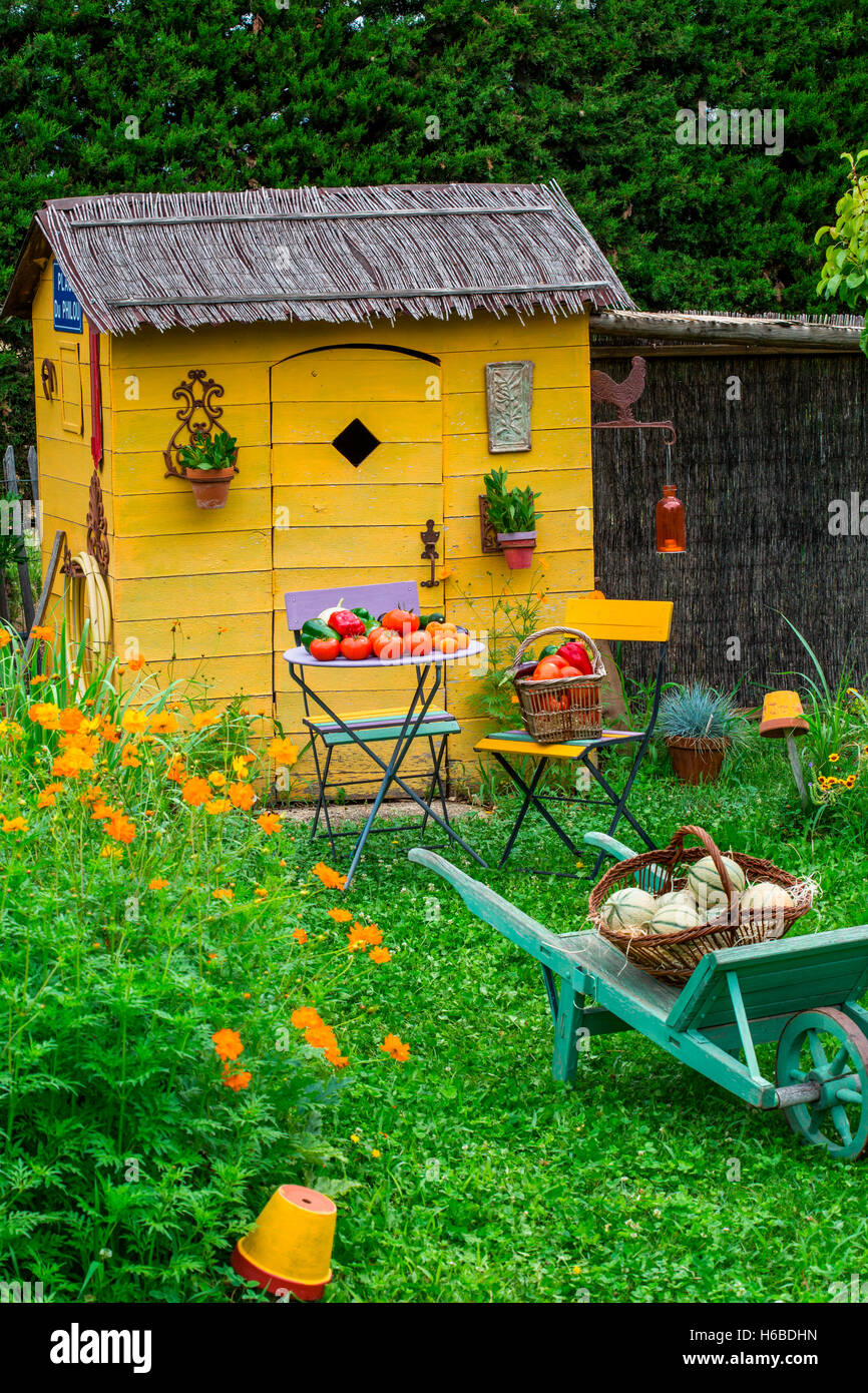 Garden shack with seating area in july, Provence, France Stock Photo ...