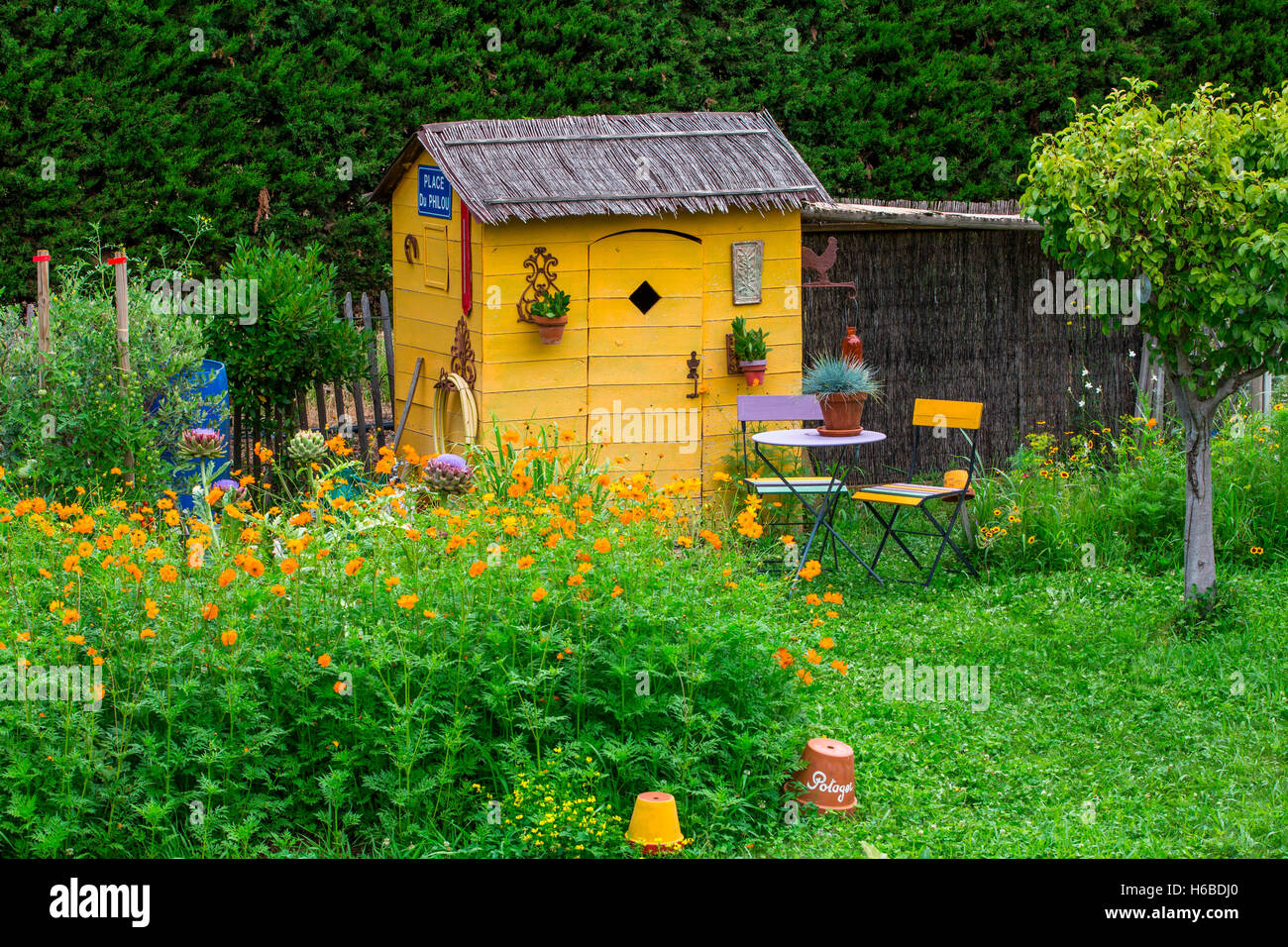 Garden shack with seating area in july, Provence, France Stock Photo ...