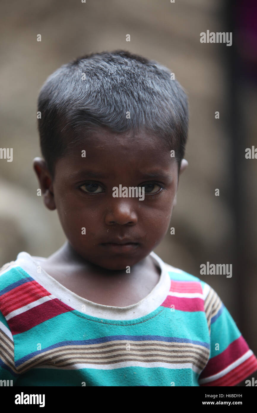 Sad indian boy hi-res stock photography and images - Alamy