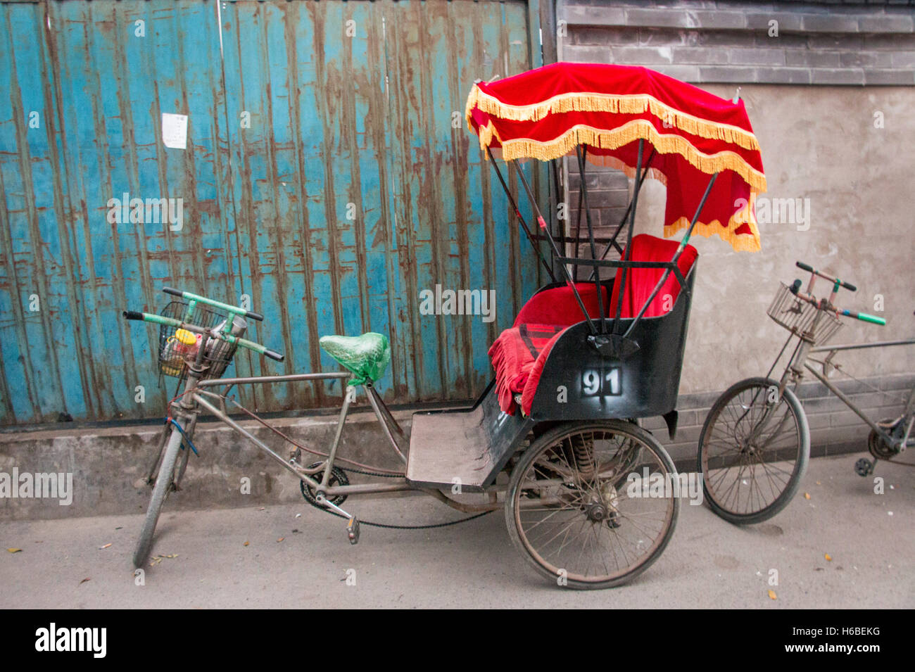 Rickshaw in Beijing waiting for visiting tourists. People's Republic of ...