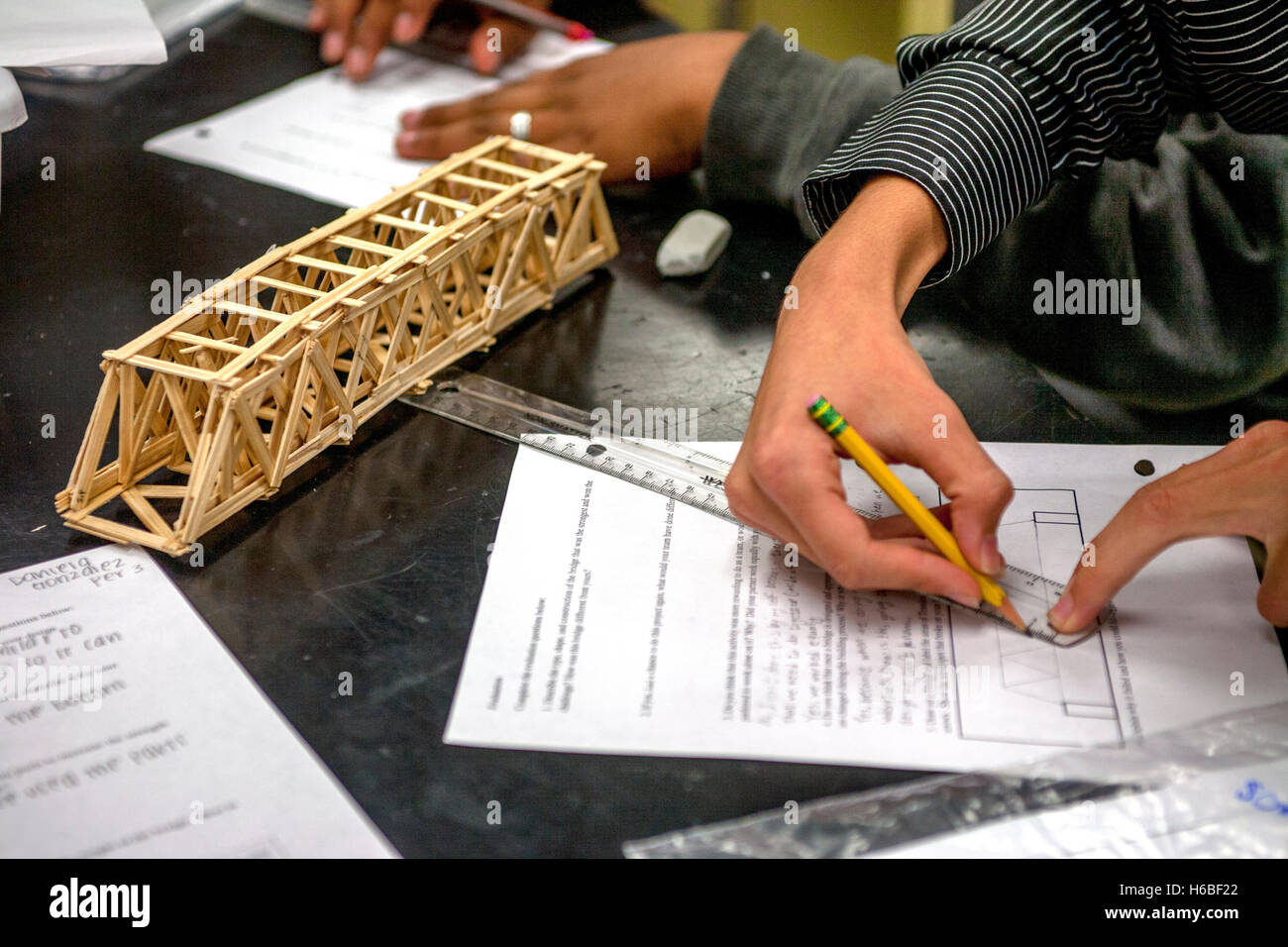 A high school student in Mission Viejo, CA, makes a mechanical drawing ...