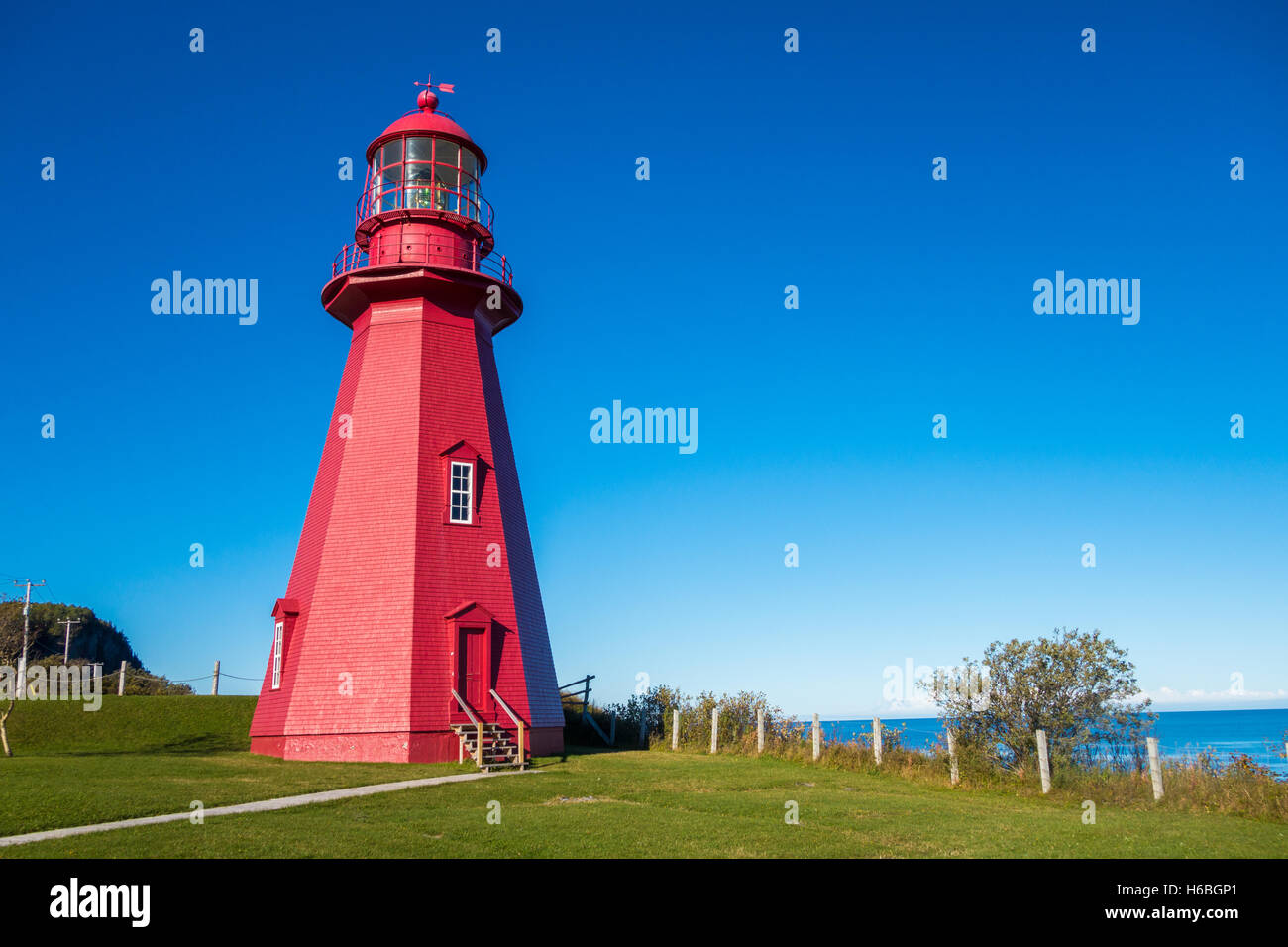 Red Lighthouse in La Martre, Quebec, Canada (Gaspe Peninsula Stock ...