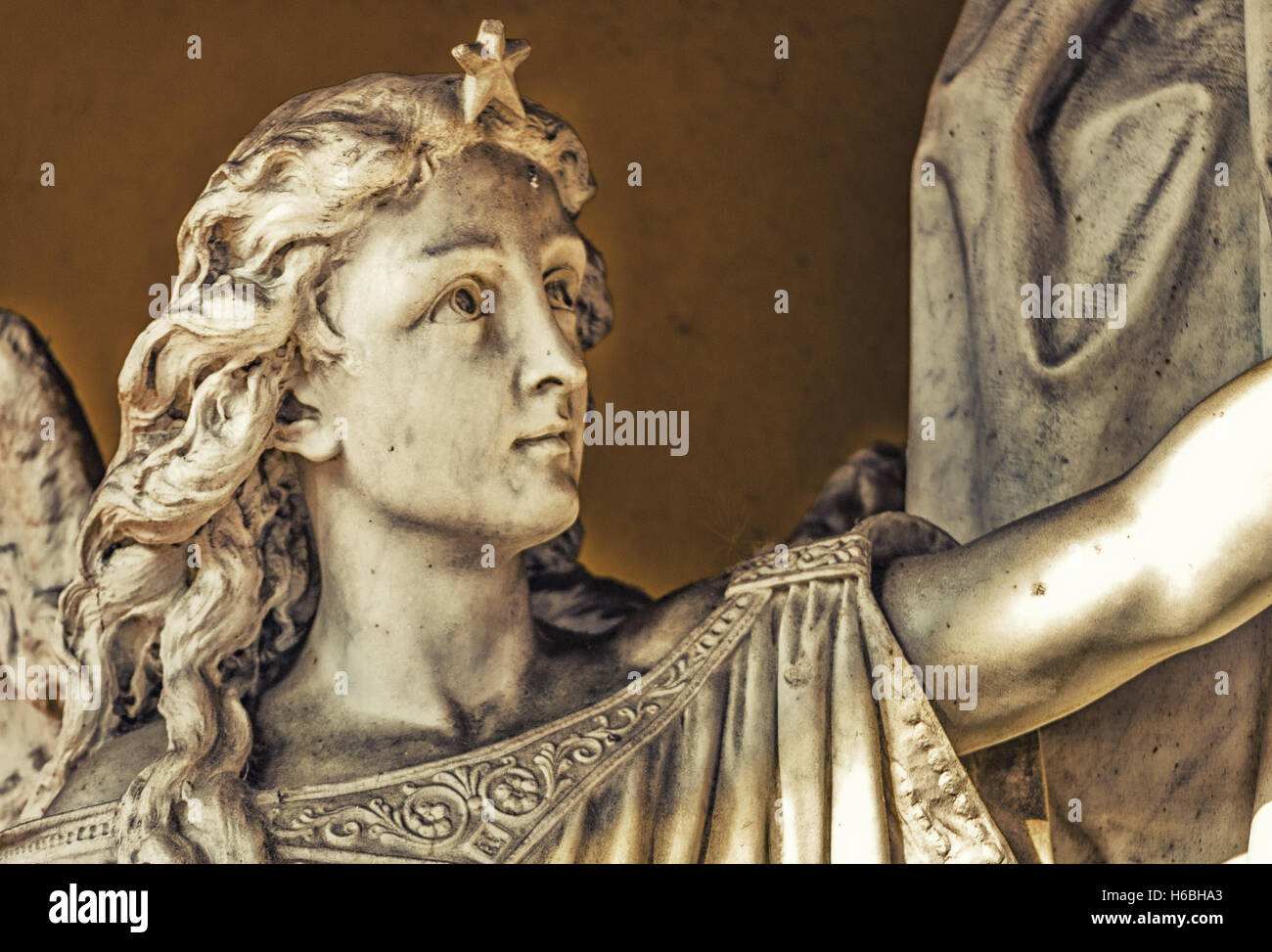 Old angel statue in marble Stock Photo - Alamy