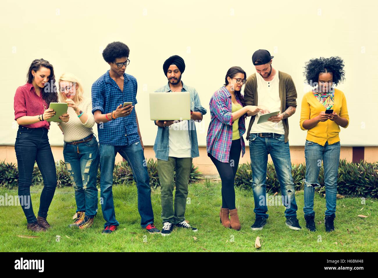 College Students Using Digital Devices Concept Stock Photo - Alamy