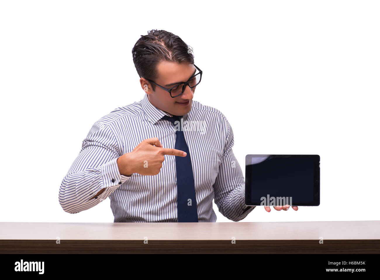 Man presenting using tablet computer Stock Photo - Alamy