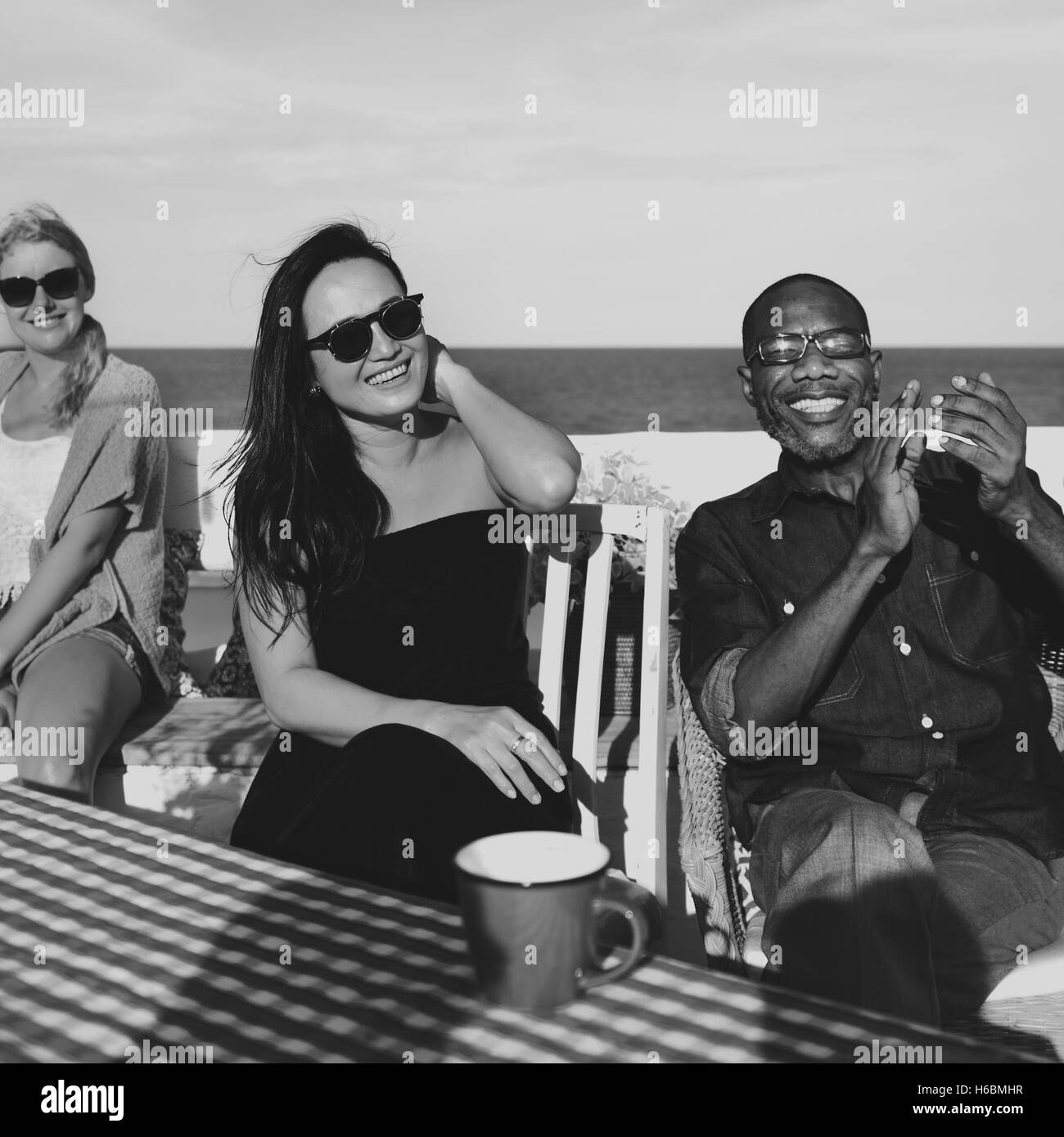 Multiethnic smiling Black and White Stock Photos & Images - Alamy