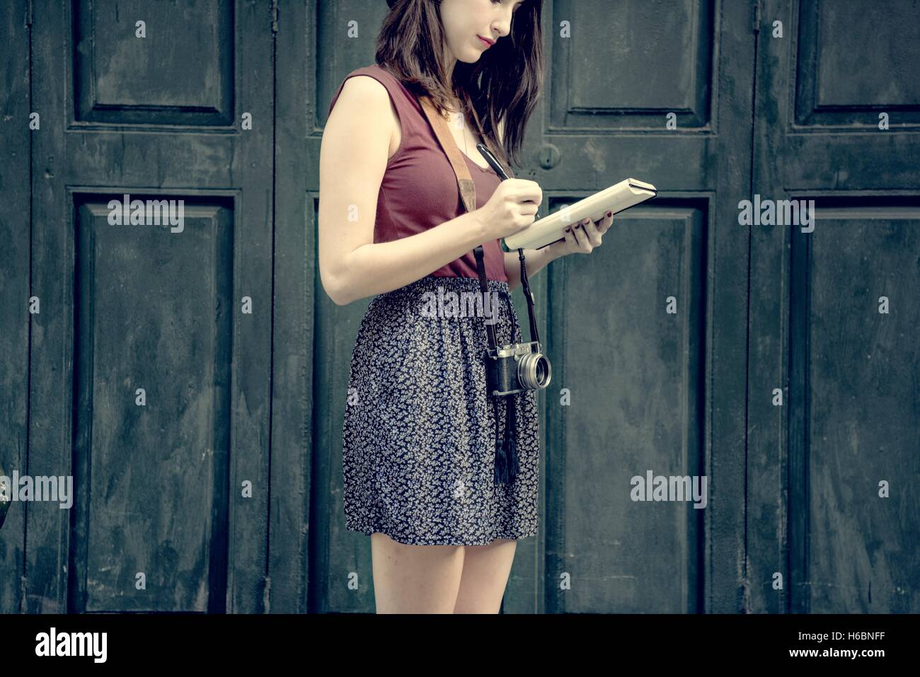 Woman Making Notes Outside City Concept Stock Photo - Alamy