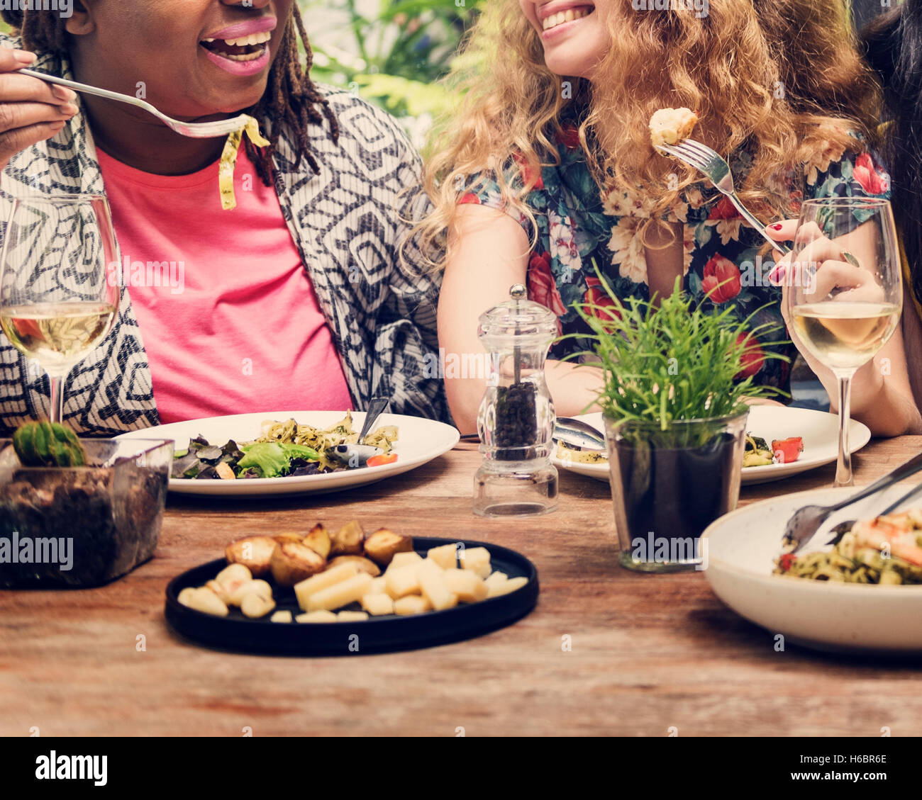 Diversity Women Group Hanging Eating Together Concept Stock Photo - Alamy