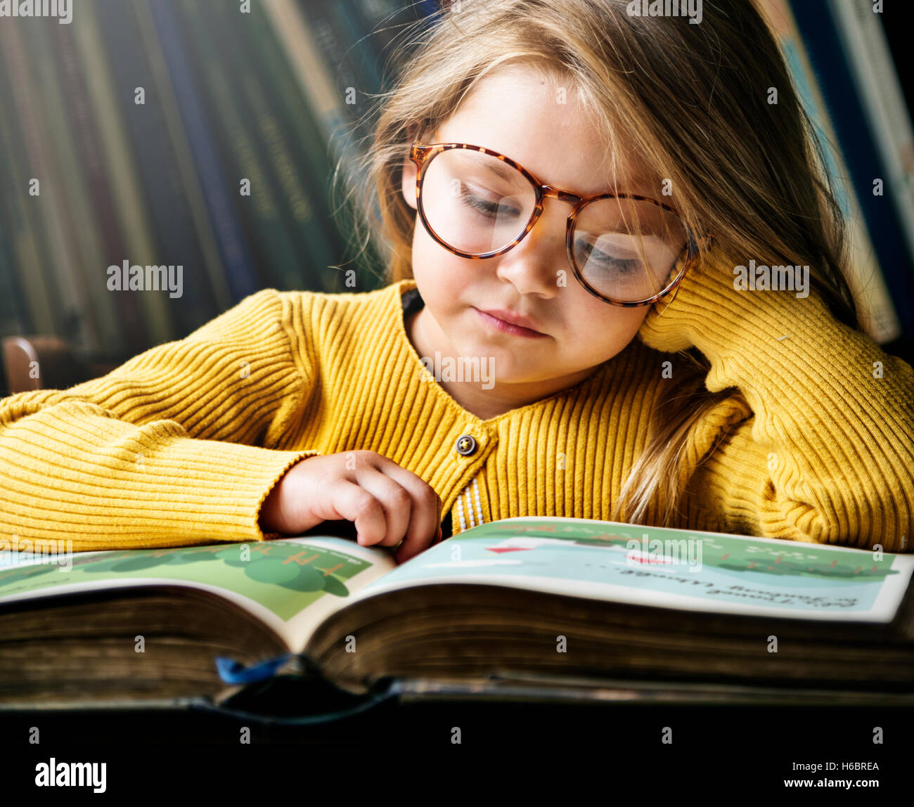 Adorable Cute Girl Reading Storytelling Concept Stock Photo - Alamy