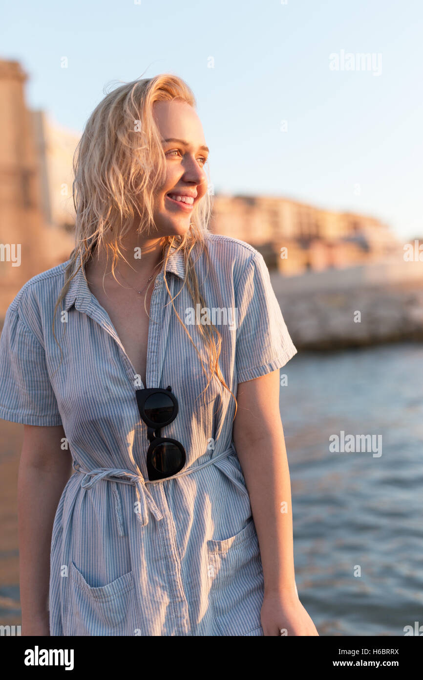 Beautiful female model having fun on the beach Stock Photo - Alamy