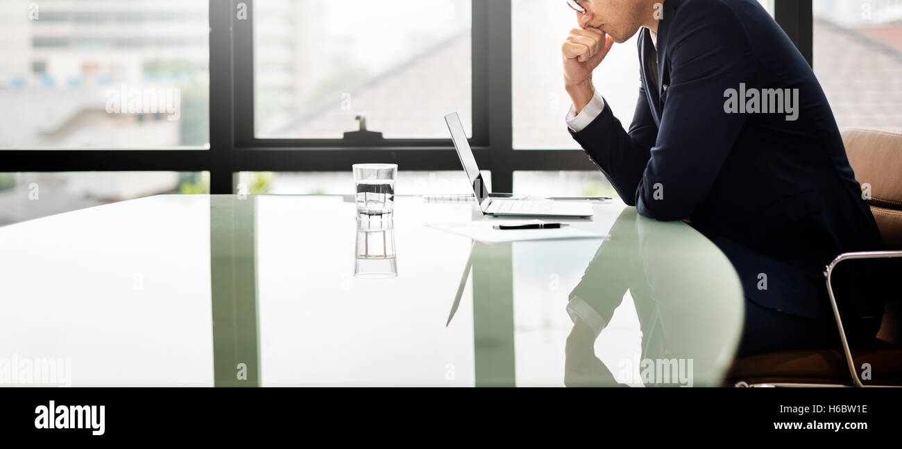 Businessman Office Thinking Laptop Concept Stock Photo - Alamy