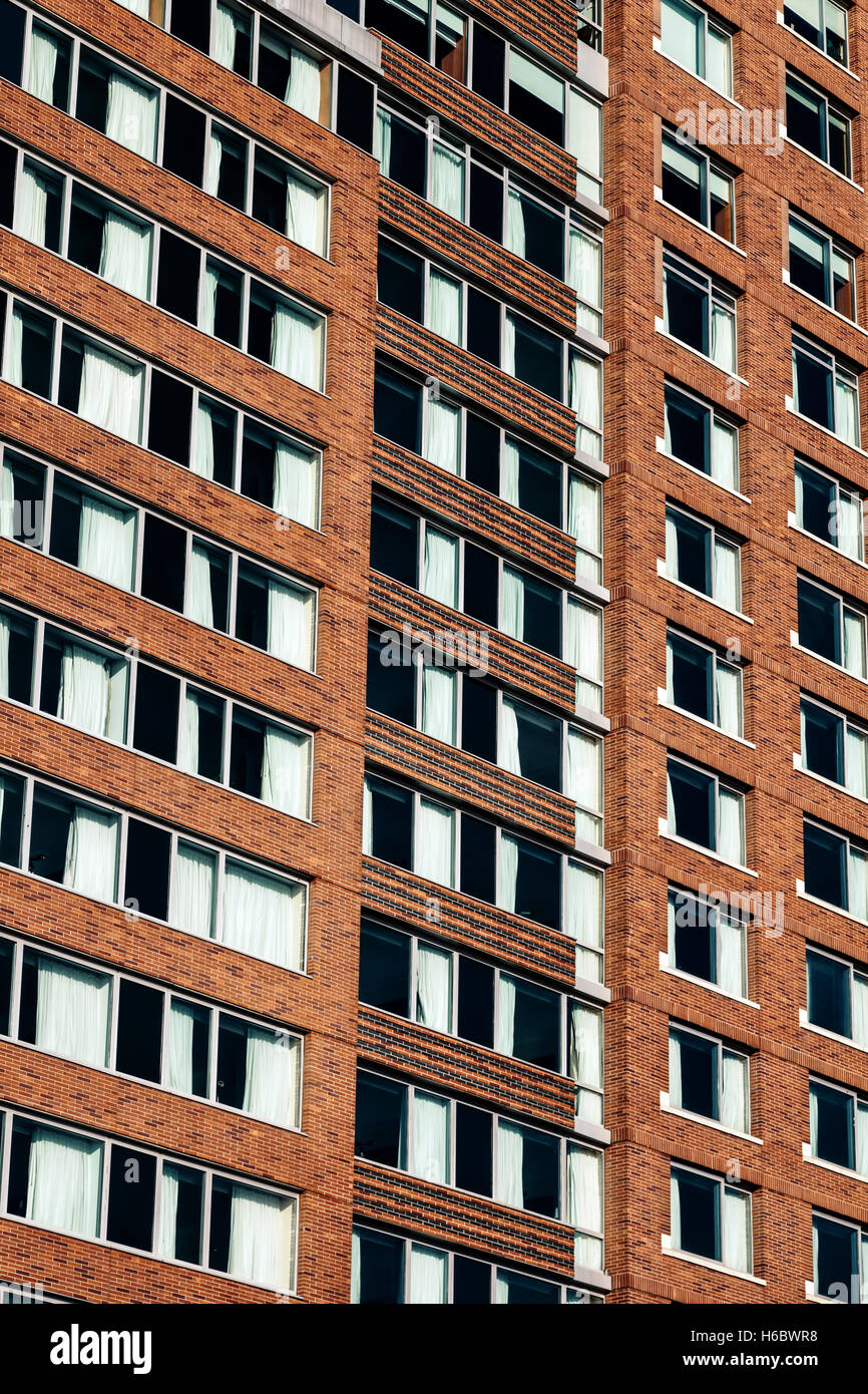 A large apartment building is filling the frame with its windows Stock ...