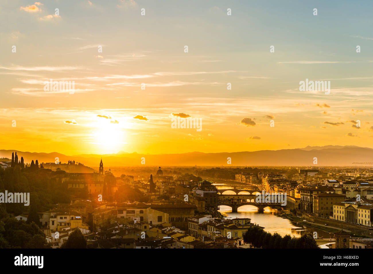 View of city at sunset from Michelangelo Square, Piazzale Michelangelo ...