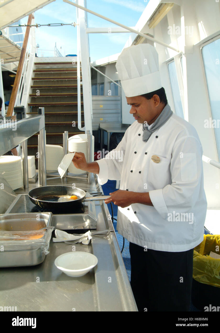 Cook on cruise liner Stock Photo - Alamy
