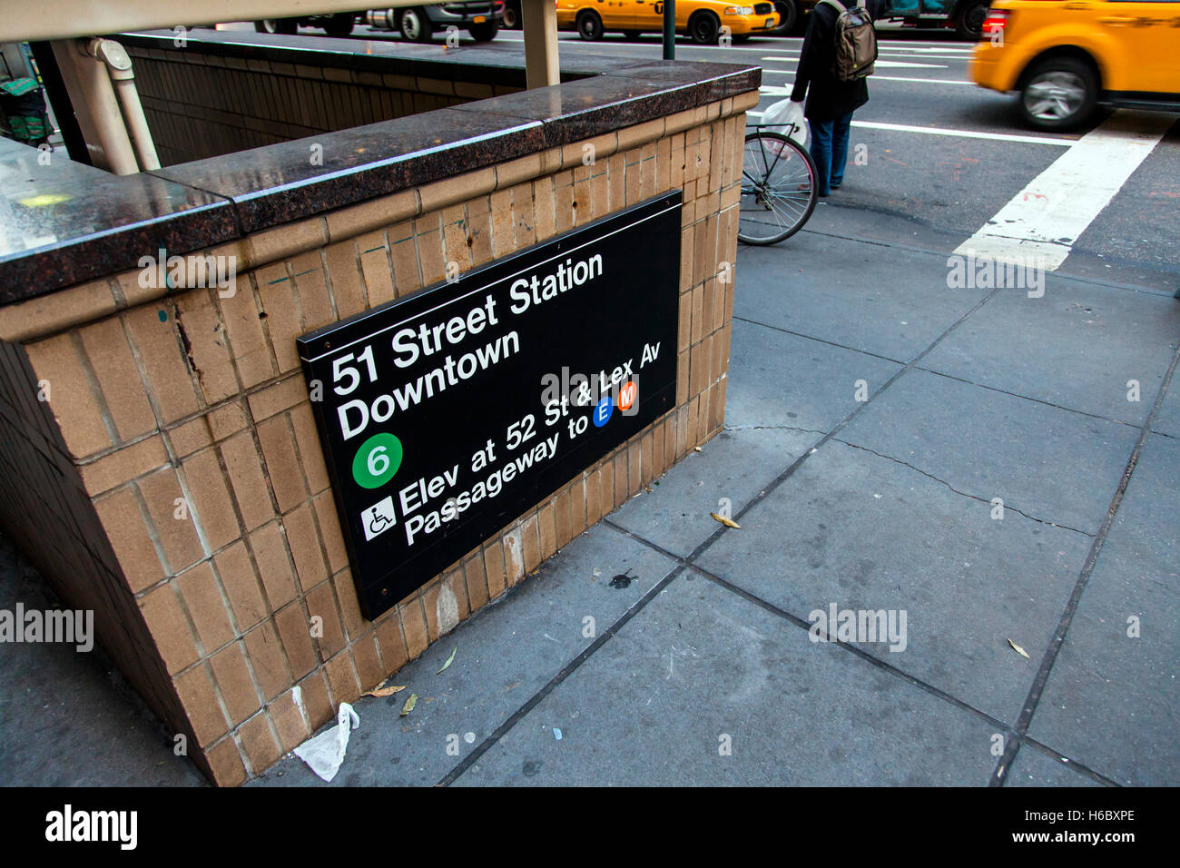Sign depicting its the entrance to the 51 st. subway station for ...