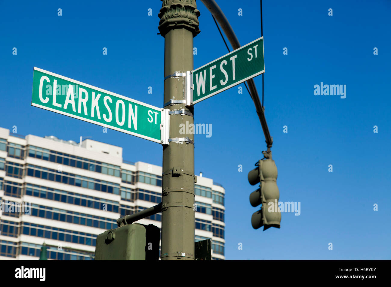 Street sign depicting it is the intersection of the streets Clarkson ...