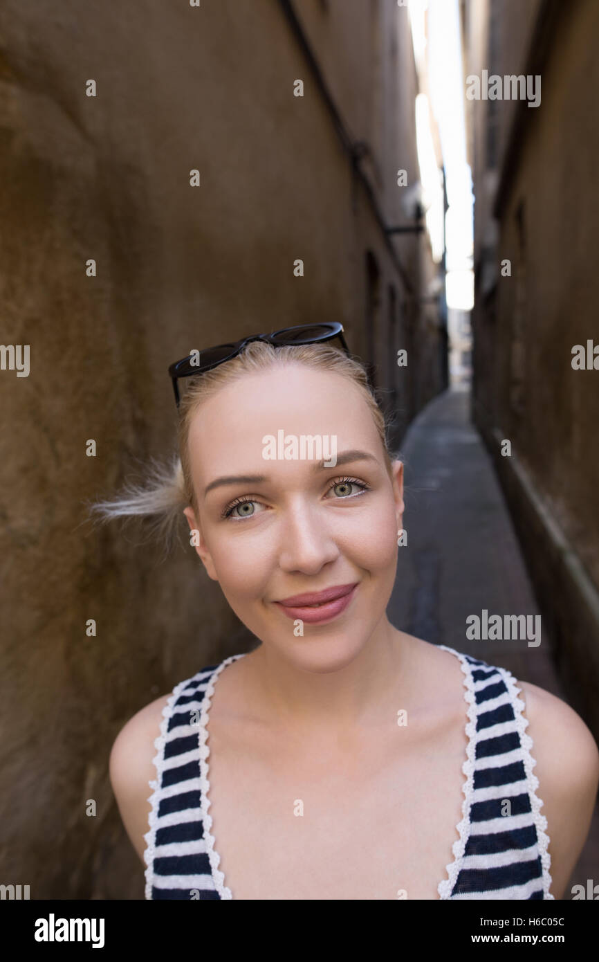 Pretty young woman traveler enjoying her travel in Europe Stock Photo ...