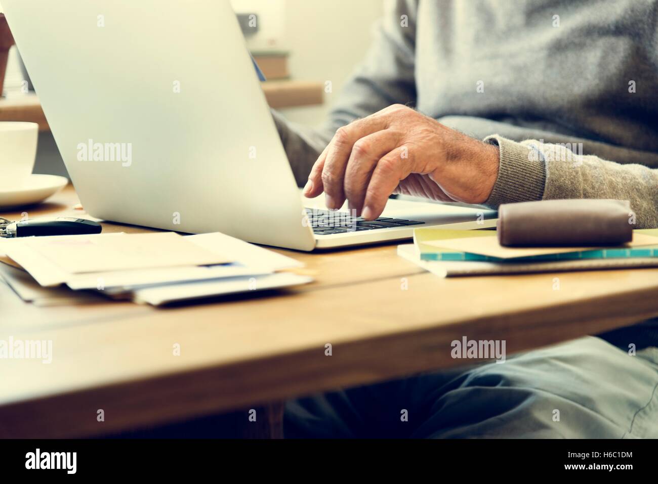 Senior Adult Using Laptop Thinking Concept Stock Photo - Alamy