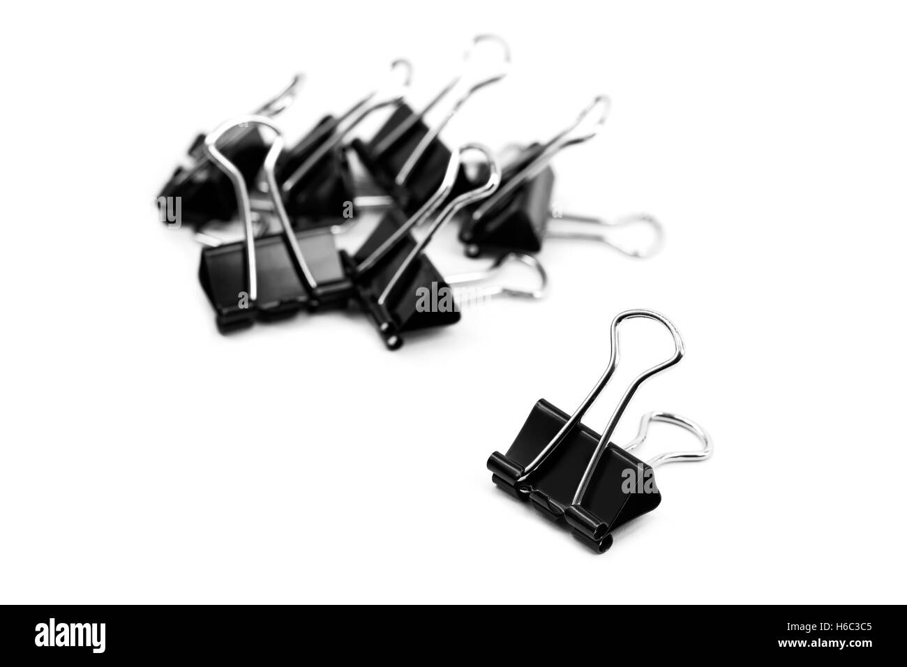 Binder clip, Paper clip isolated on white background Stock Photo - Alamy