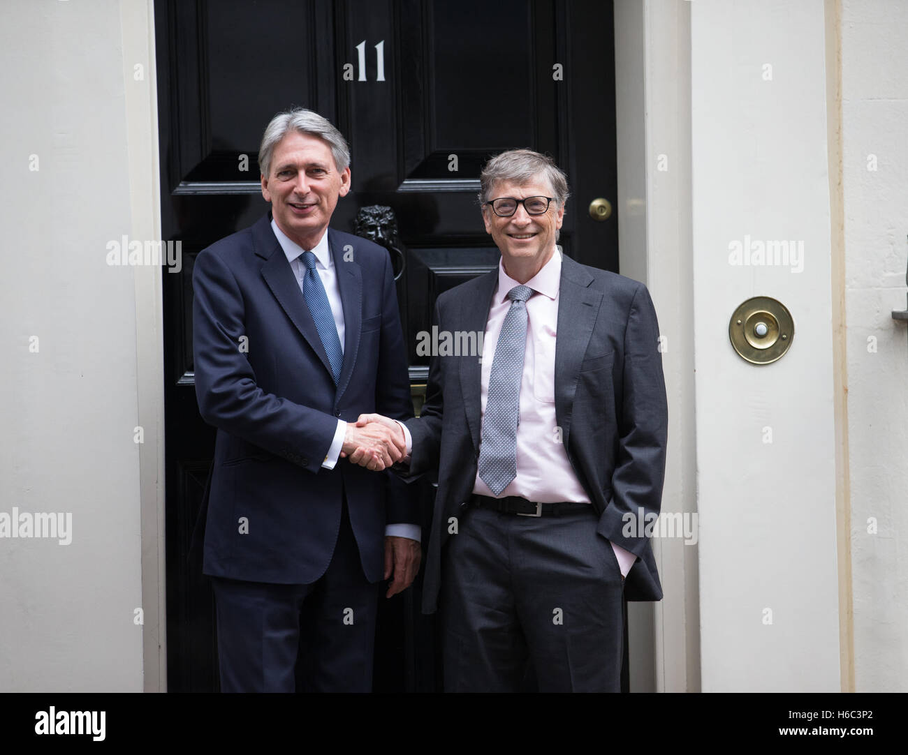 Steve Jobs And Bill Gates Shaking Hands