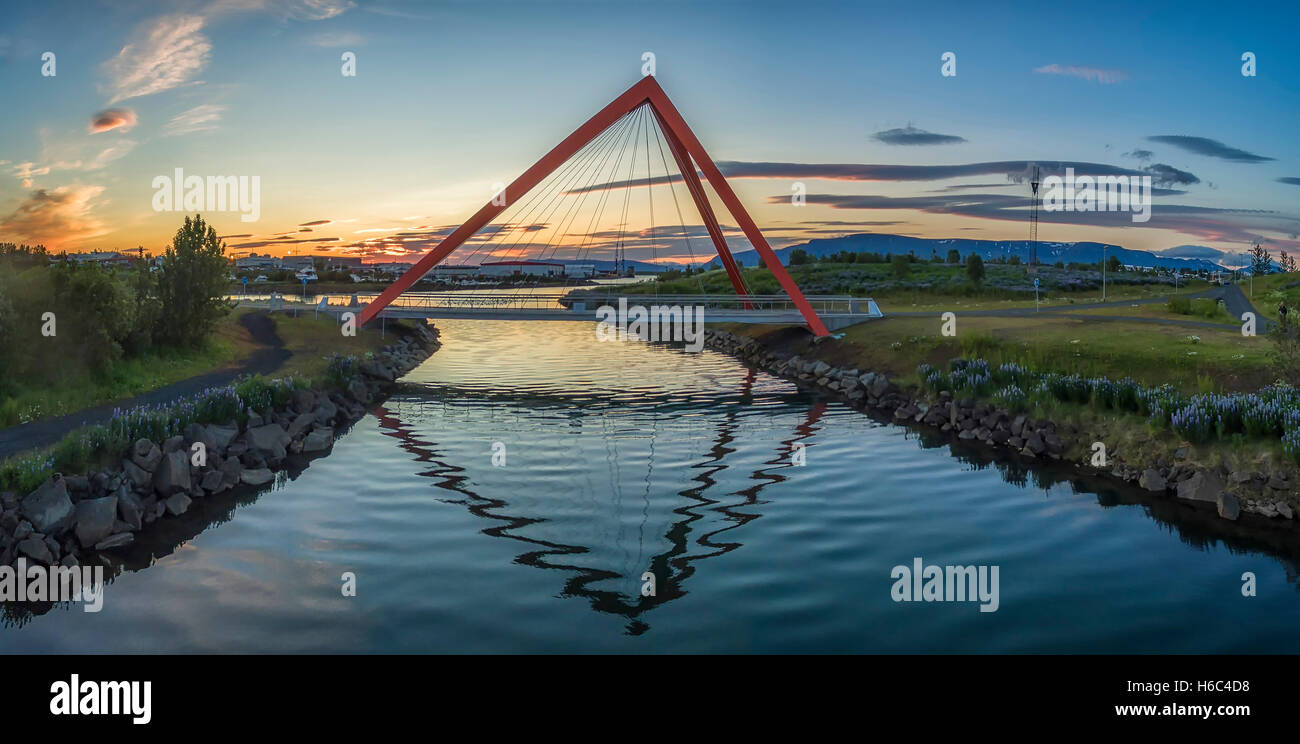 Walking bridge over Ellidaar river, Reykjavik, Iceland Stock Photo - Alamy