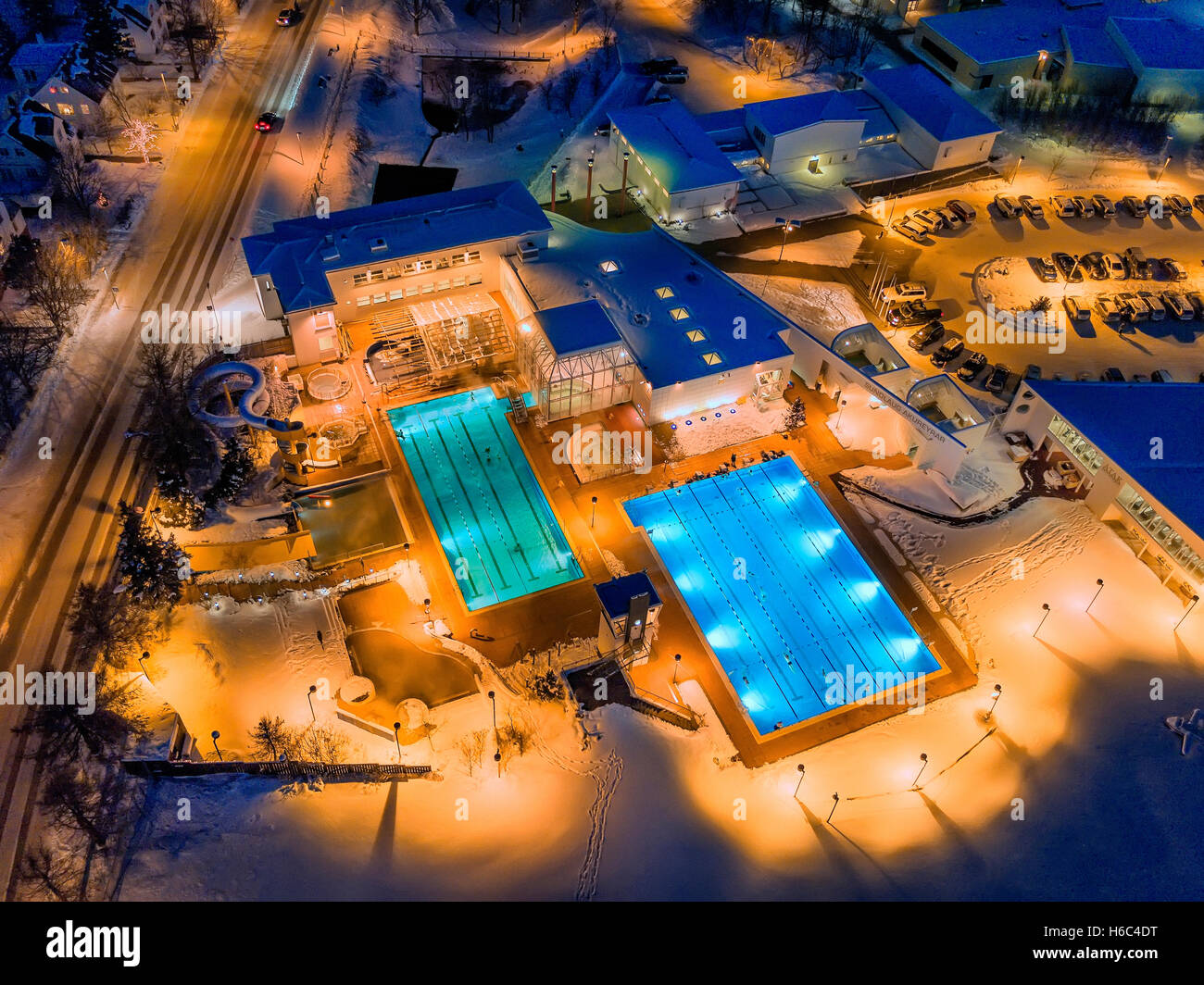 Aerial view- Swimming pools in the winter, Akureyri, Iceland. This ...