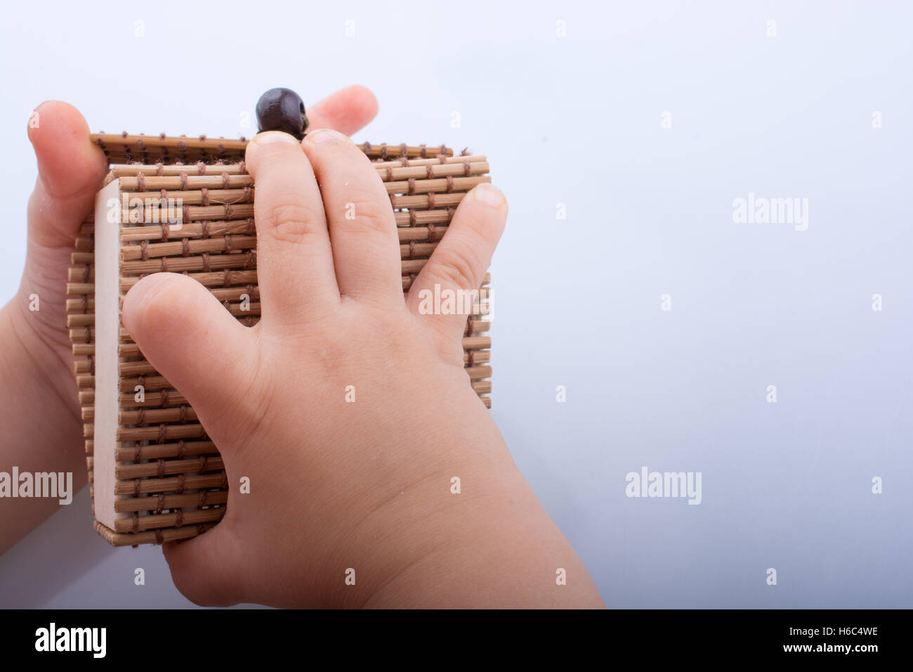 Little Straw wooden box of light brown color Stock Photo - Alamy