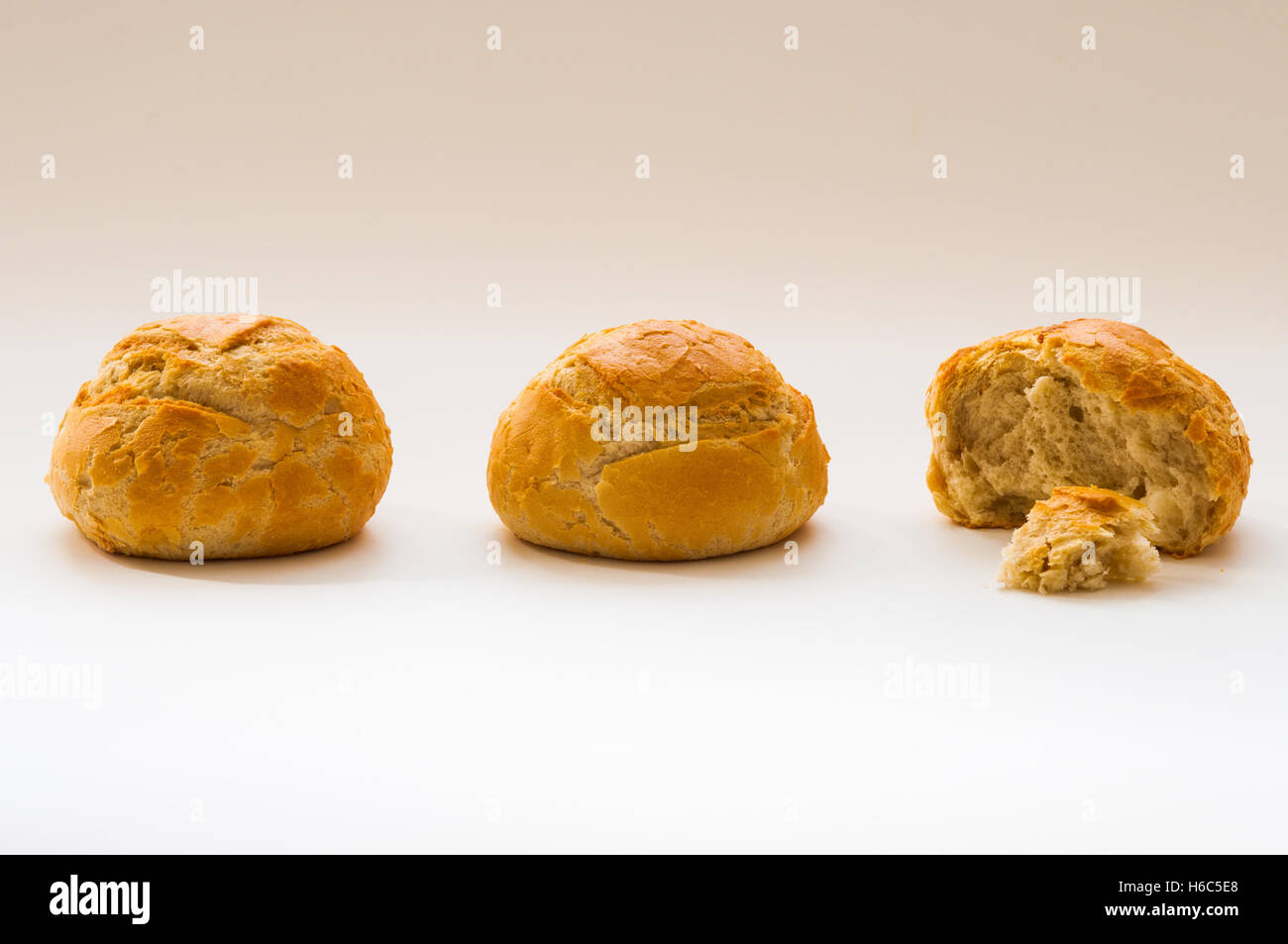 Two and a half bread rolls Stock Photo - Alamy