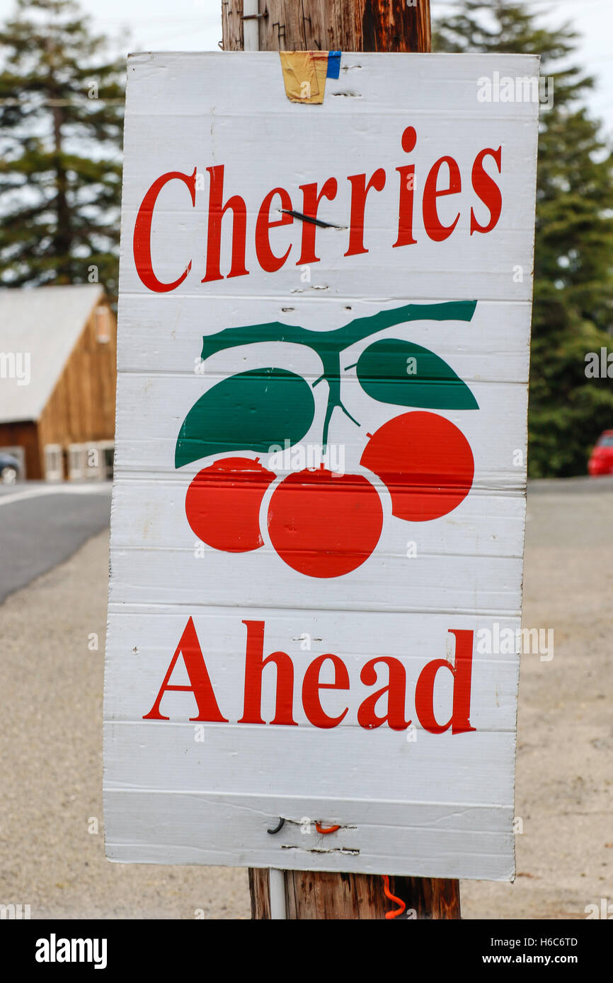 Cherries sign for farmer's market Stock Photo - Alamy