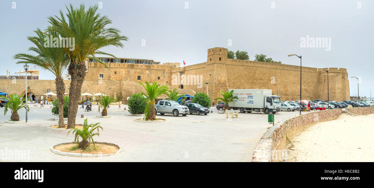 The modern promenade with the view on high walls of Medina Stock Photo ...