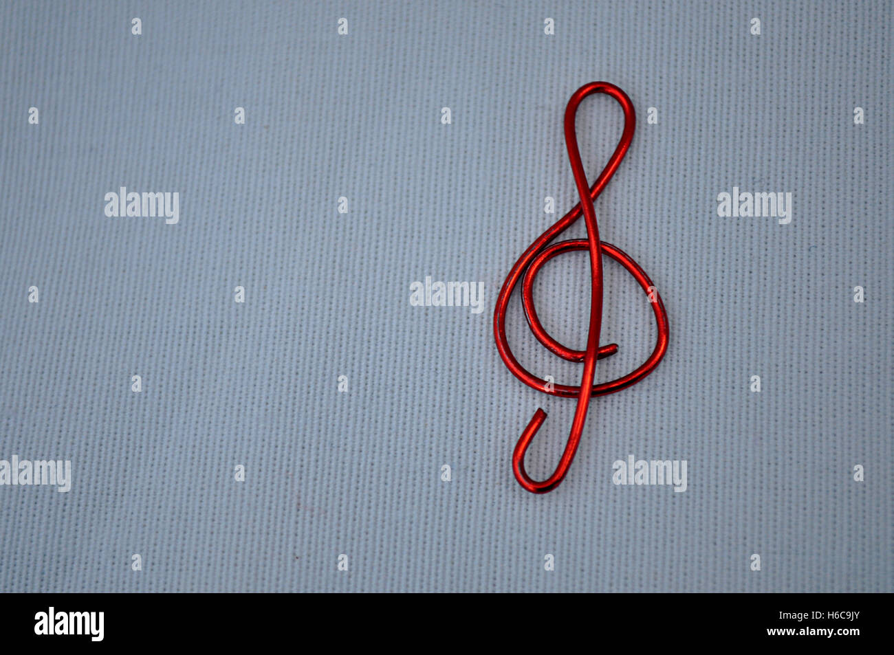 red metallic treble clef Stock Photo - Alamy