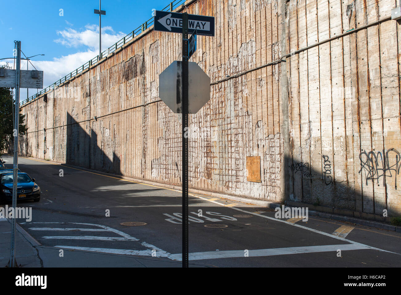 A distressedconcrete wall at an exit to the Brooklyn-Queens Expressway ...